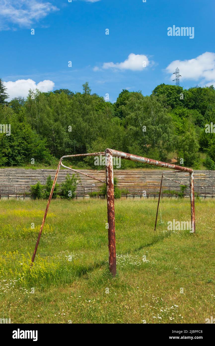 Abandoned pitch with rusty goals. Consequence of the white plague Stock ...