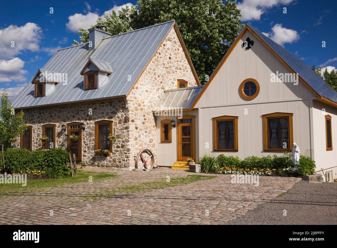 Replica of old 1700s French regime cottage style fieldstone home with ...