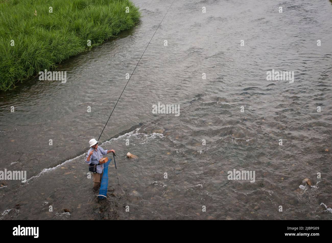 Stream fishing, Japan Stock Photo - Alamy