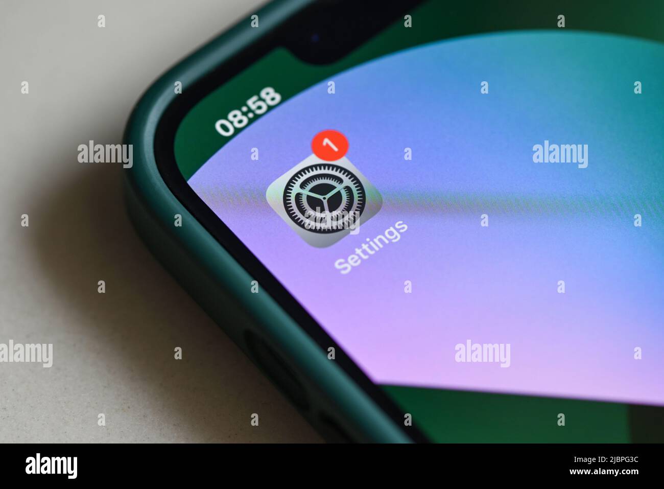 iPhone 13 Pro with notification software update on settings app iOS 15. ...