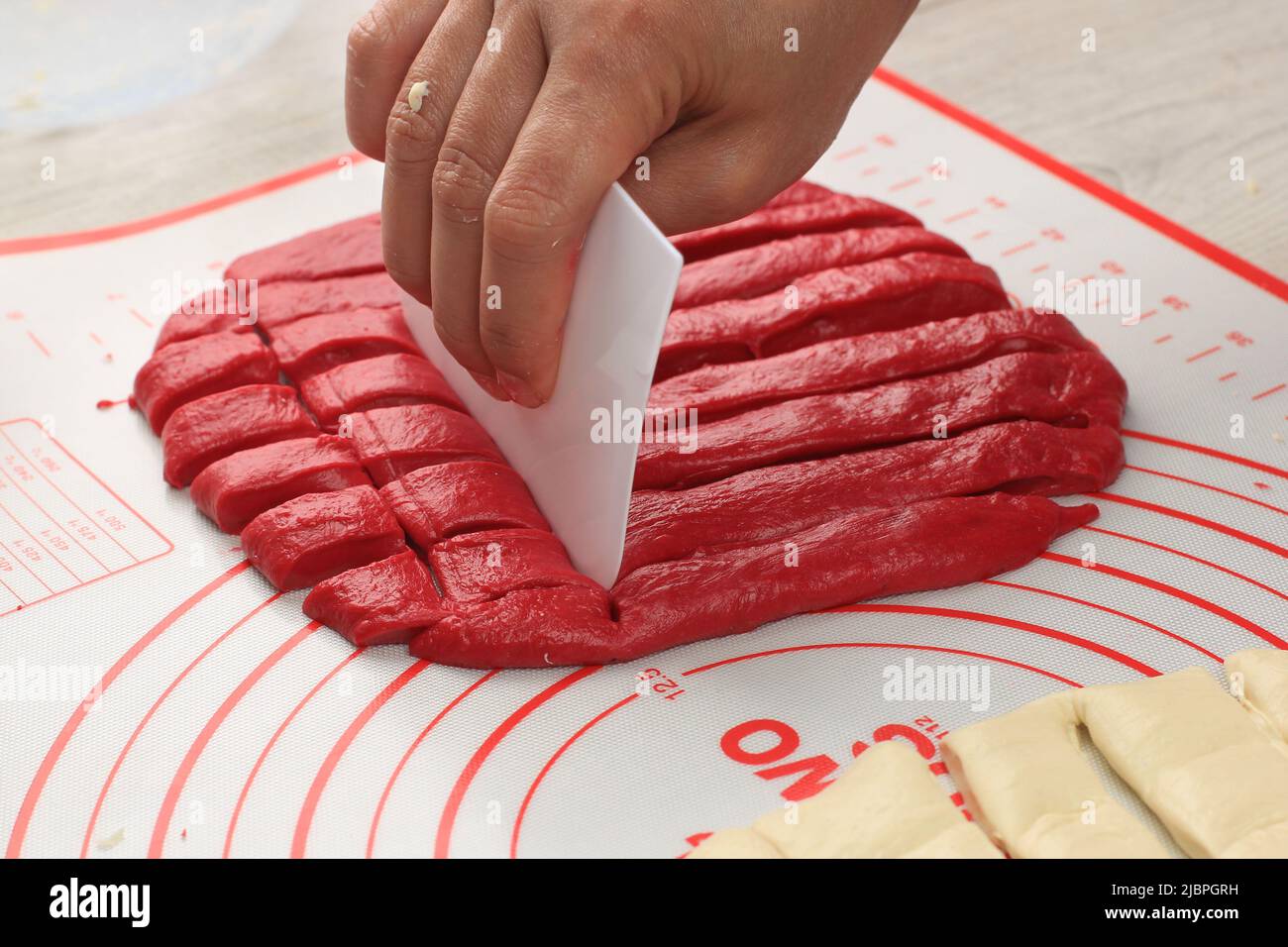 Cutting Raw Red Bread Dough Using Plastic Scrapper Step By Step Making Pizza In The Kitchen