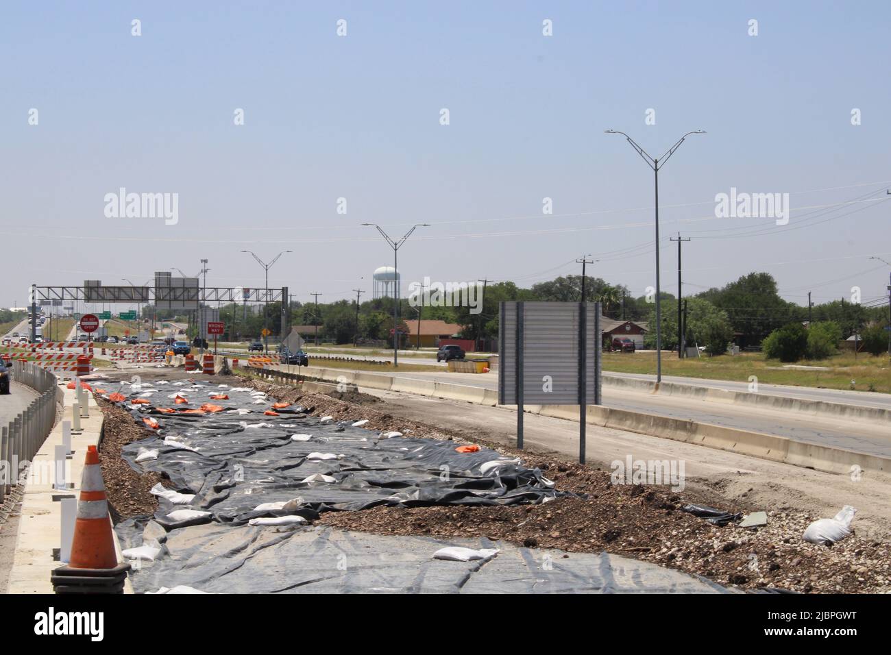 Traffic passes by a construction site at I-410 at Valley Hi Drive in ...