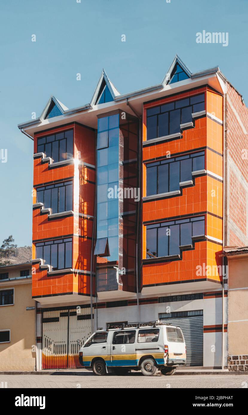 QUIME, LA PAZ, BOLIVIA - JULY 30, 2016: A van parked next to a typical ...