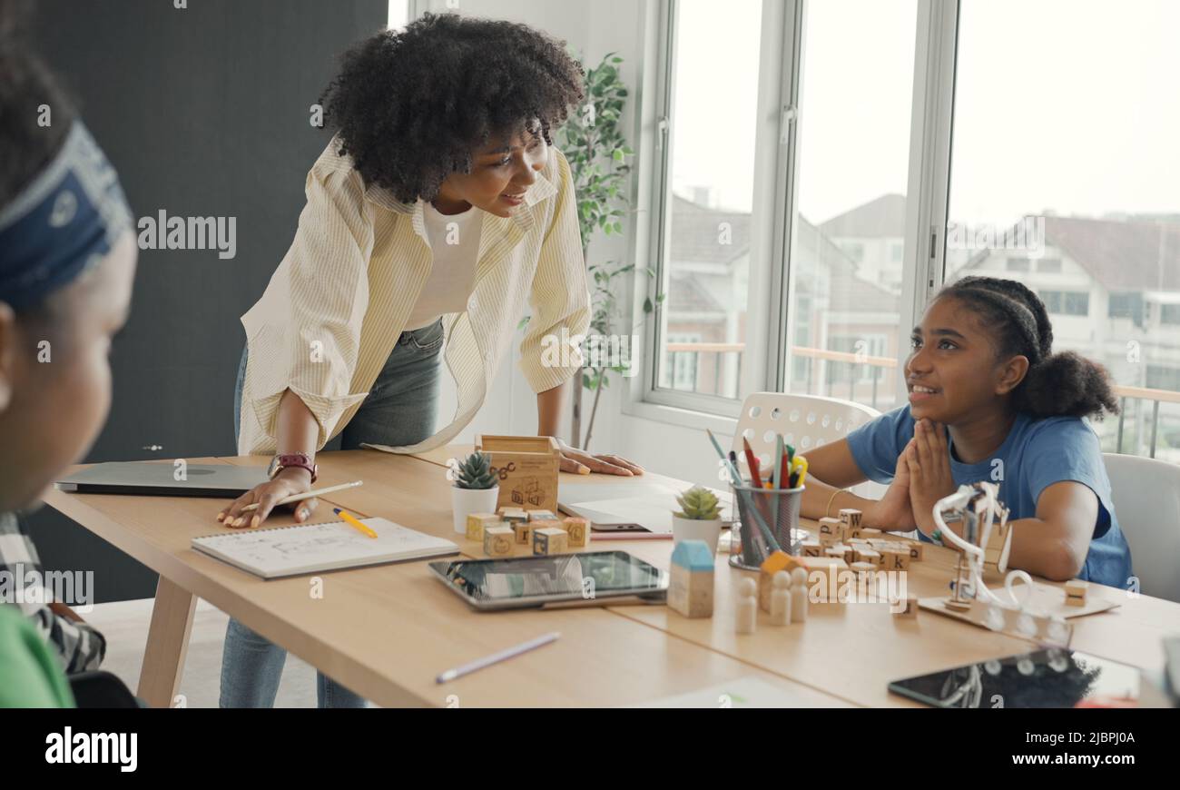 Classroom with diverse learners of happily African American students ...