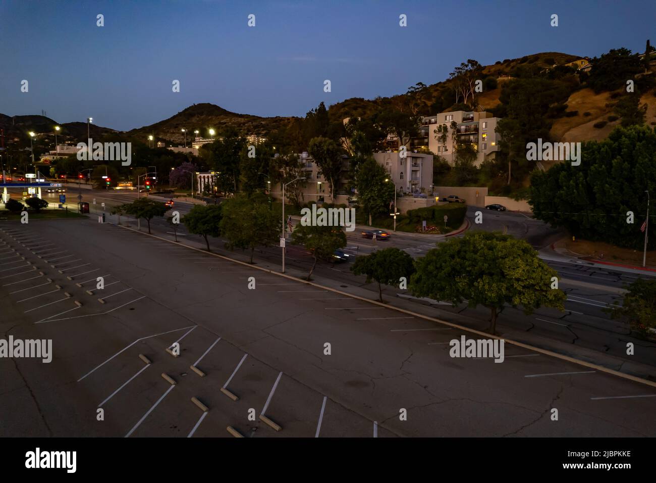 Sunset, hills and freeway Stock Photo - Alamy