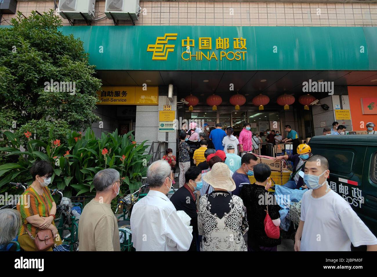 SHANGHAI, CHINA - JUNE 8, 2022 - Citizens line up in front of the China ...