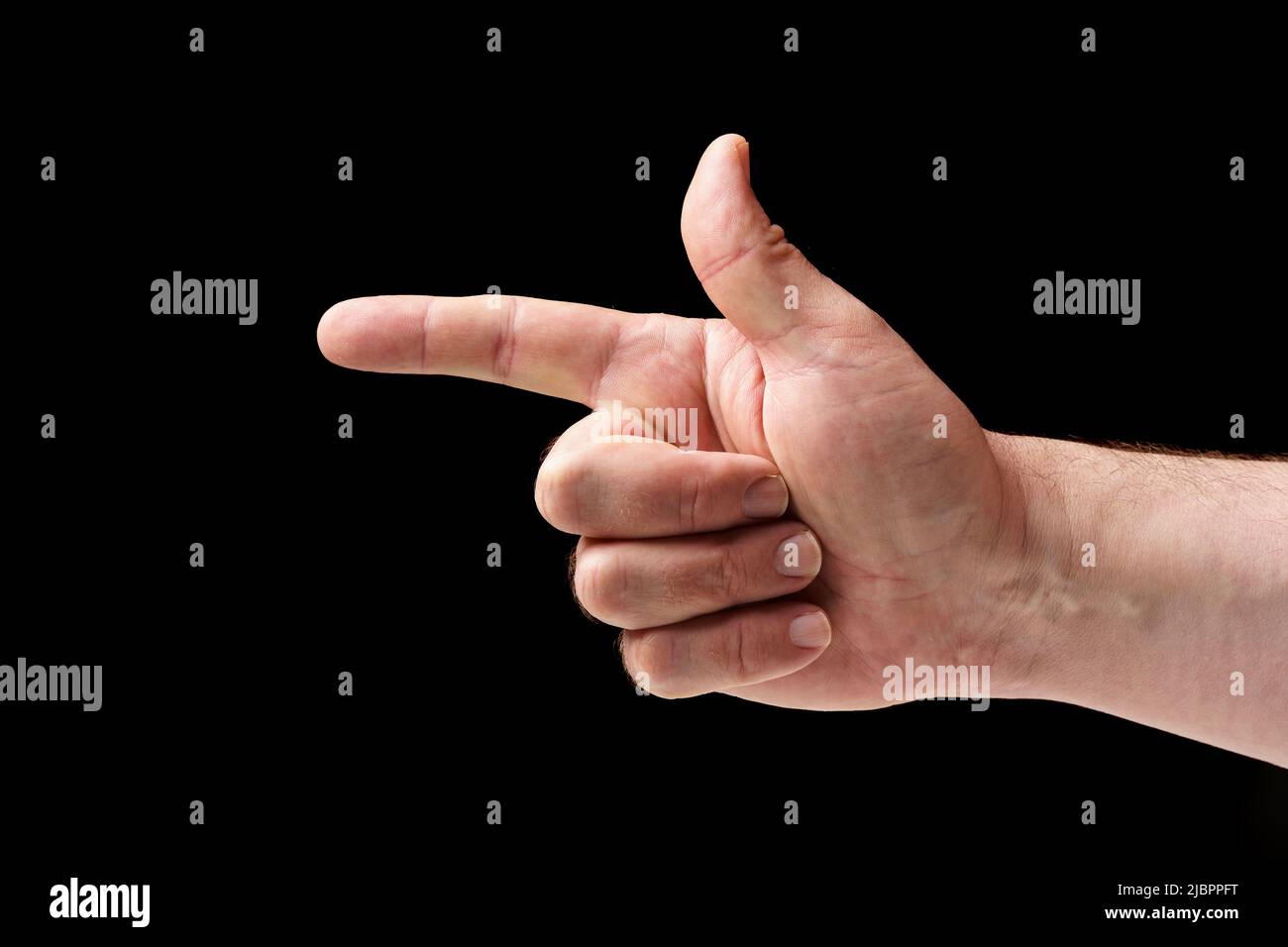Shoting gesture, male hand on black background Stock Photo - Alamy