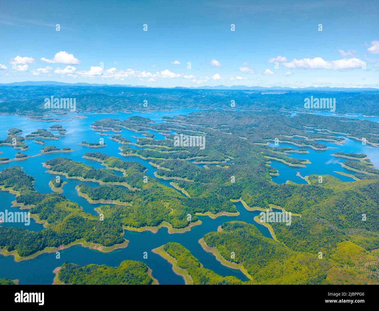 Morning at the Ta Dung lake or Dong Nai 3 lake with green hills and ...