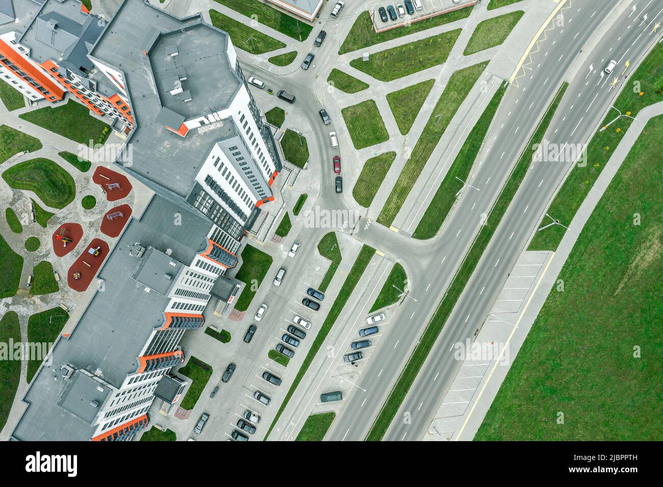 complex of residential buildings with a playground in a courtyard and ...
