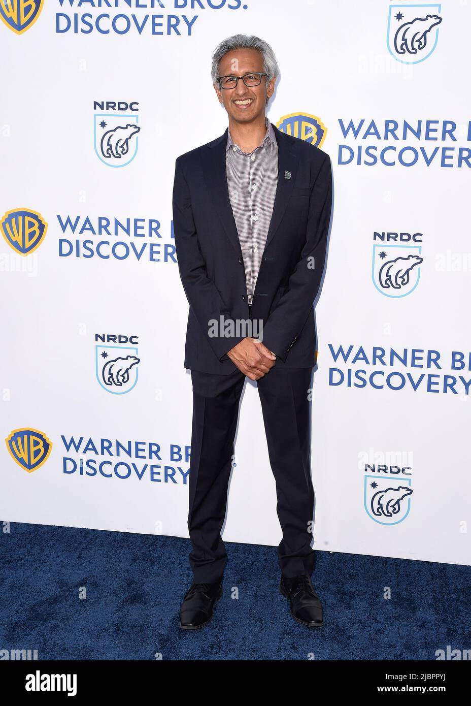 Manish Bapna walking on the red carpet at the NRDC night of Comedy at ...