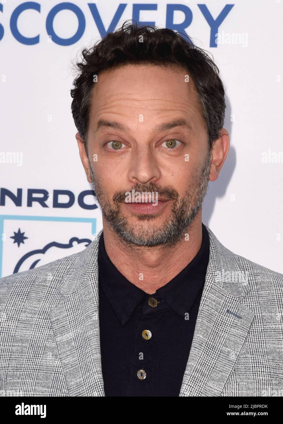 Nick Kroll walking on the red carpet at the NRDC night of Comedy at ...