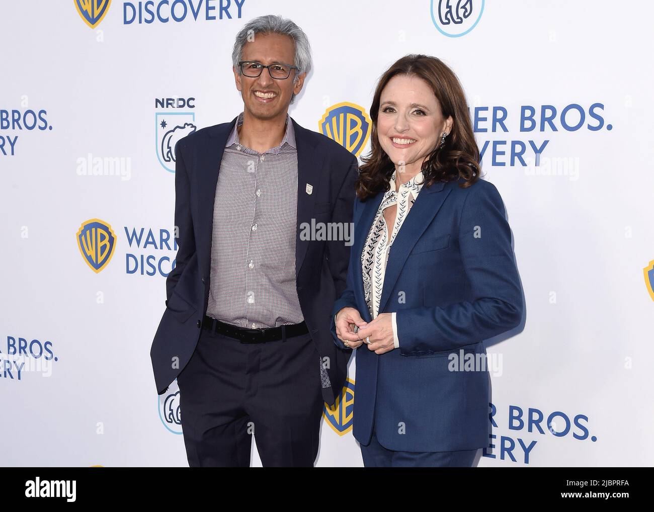 Los Angeles, USA. 07th June, 2022. Manish Bapna and Julia Louis-Dreyfus walking on the red ...