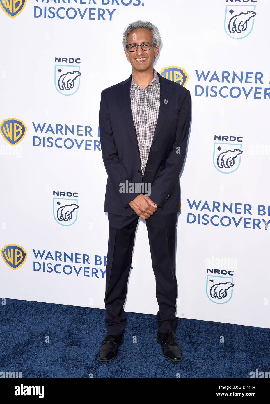 Manish Bapna walking on the red carpet at the NRDC night of Comedy at ...