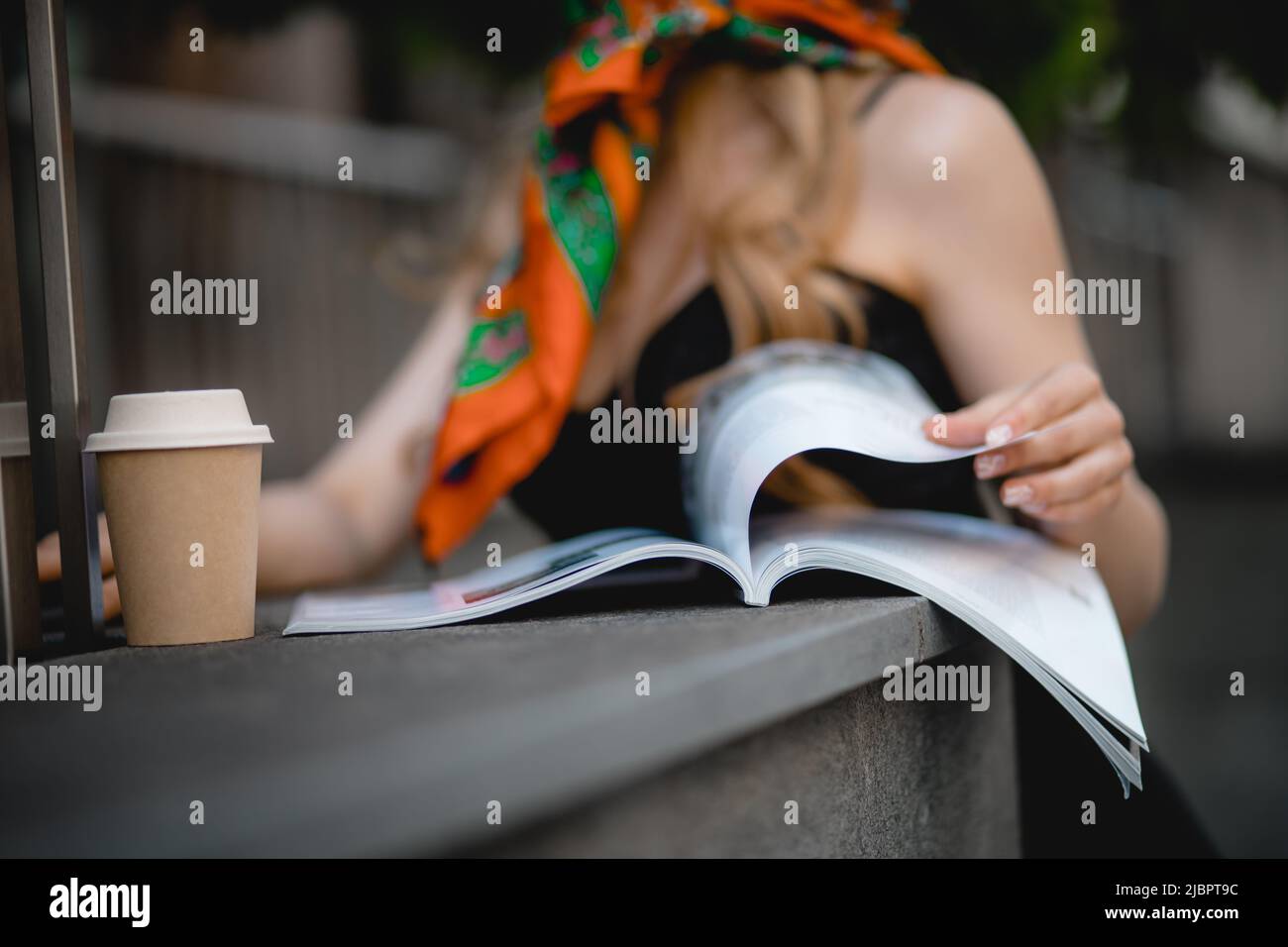 Vogue magazine reading hi-res stock photography and images - Alamy