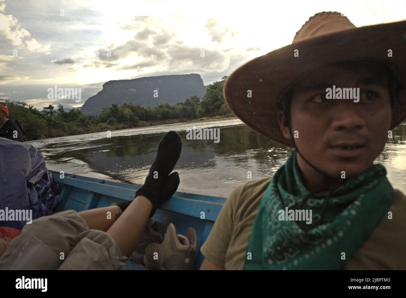 An NGO worker and an ecotourism enthusiast enjoying boat journey on ...