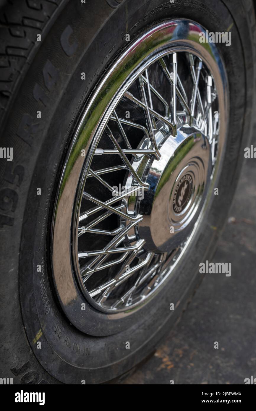 Rear side view front wheel modern alu rims of car tire, selective focus ...