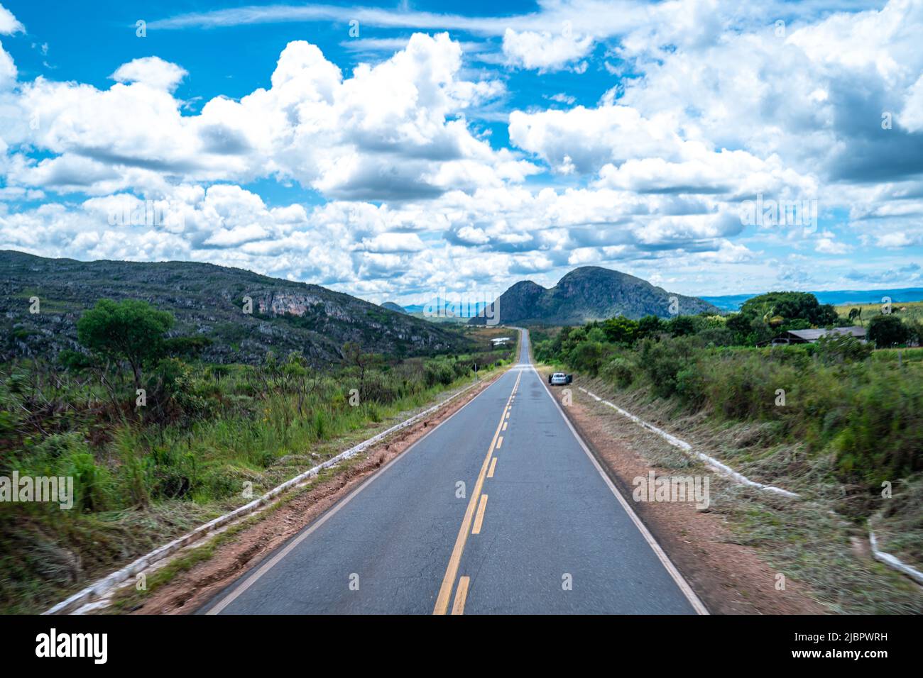 open asphalt road in natural mountain landscape Stock Photo - Alamy