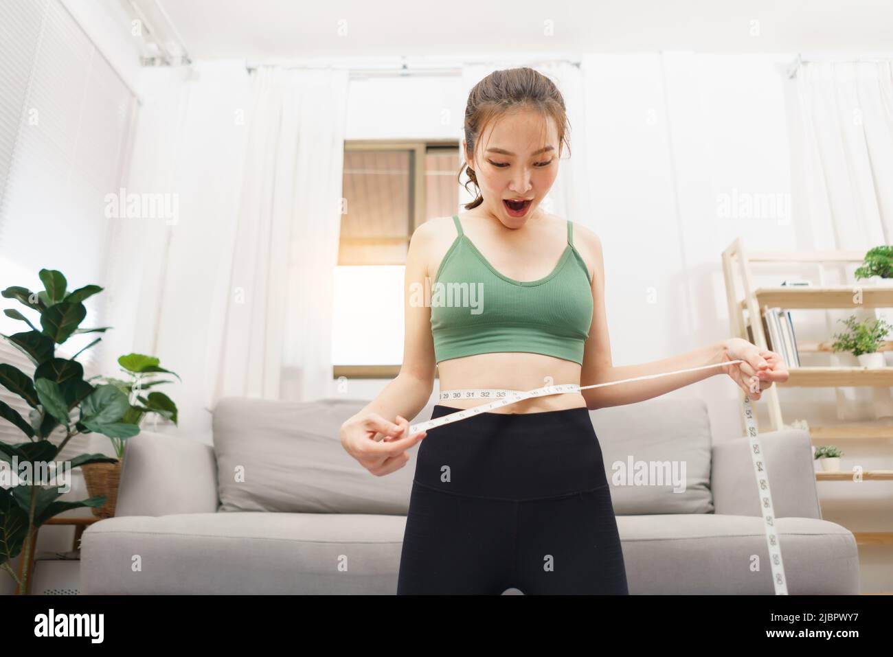 Healthy and weight loss concept, Young Asian woman excited while ...