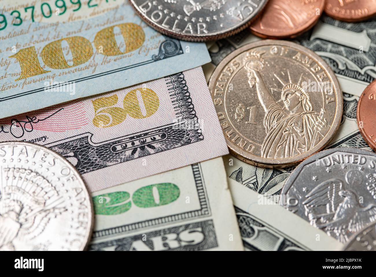 Dollar coins and banknotes, US dollar currency. Economy of the United ...