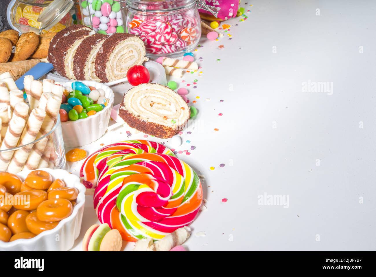 Selection of colorful sweets. Set of various candies, chocolates ...
