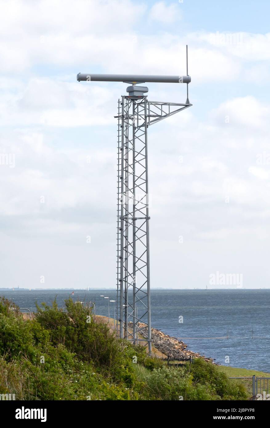 Marine traffic radar, small tower in a green area Stock Photo - Alamy