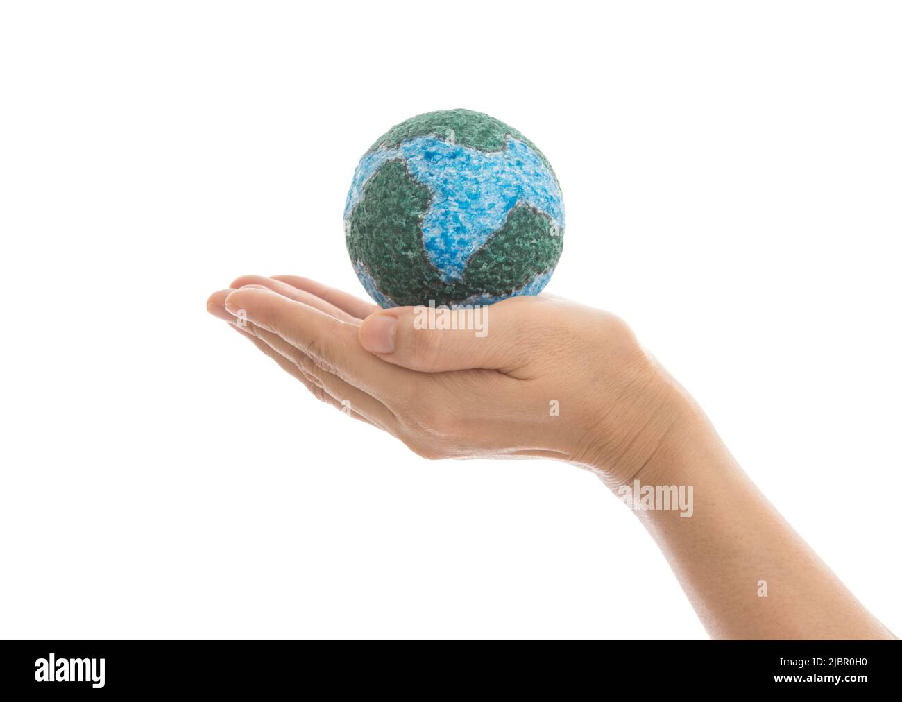 Earth in hand isolated on white background with clipping path ...