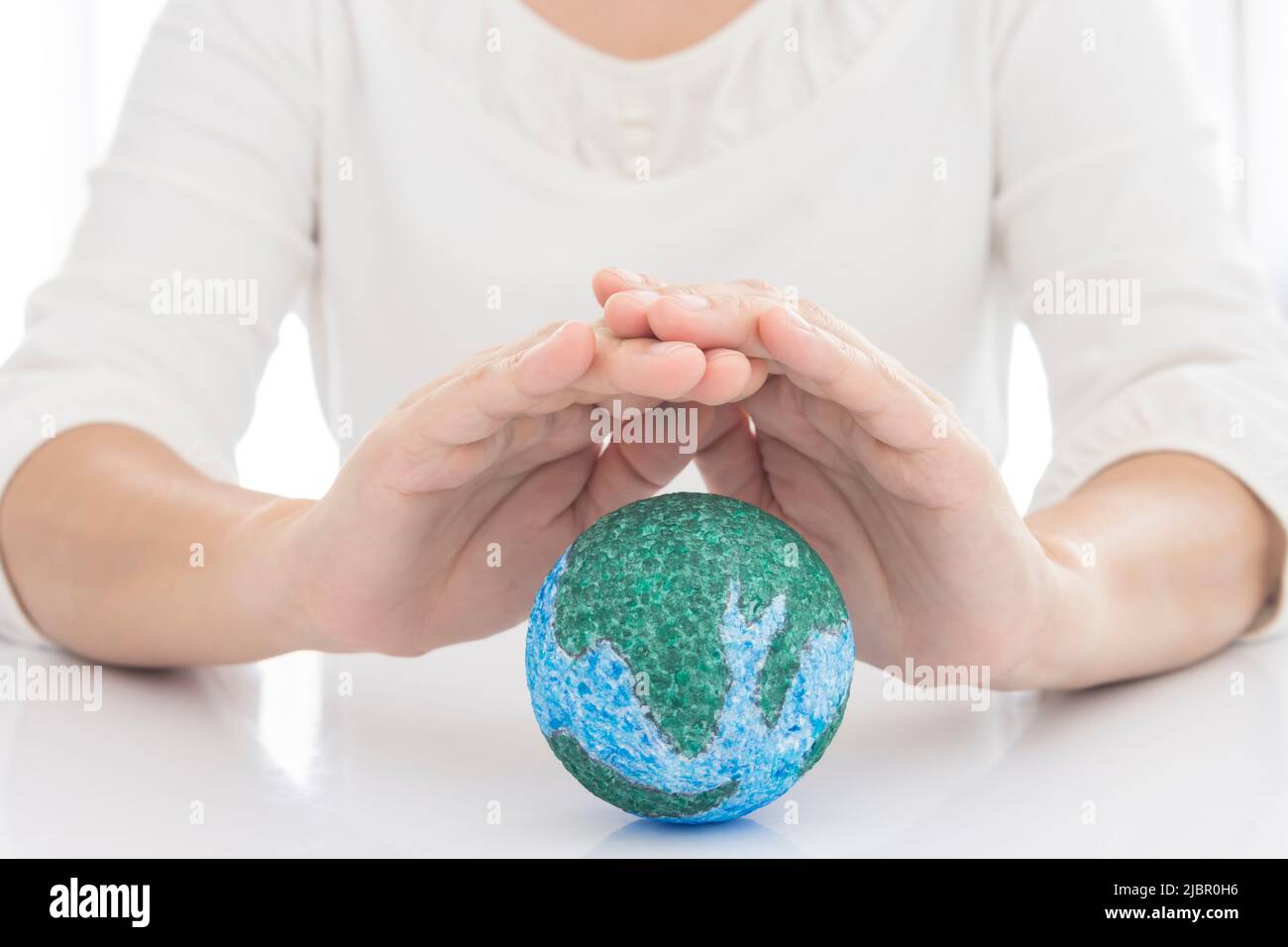 Image of human hands defending World. Concept of protect earth Stock ...