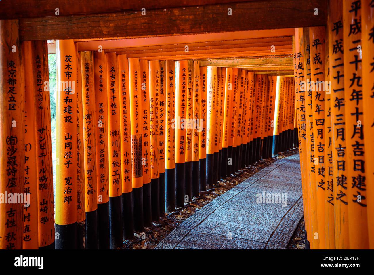Vermilion orange red torii gate tunnel hi-res stock photography and ...
