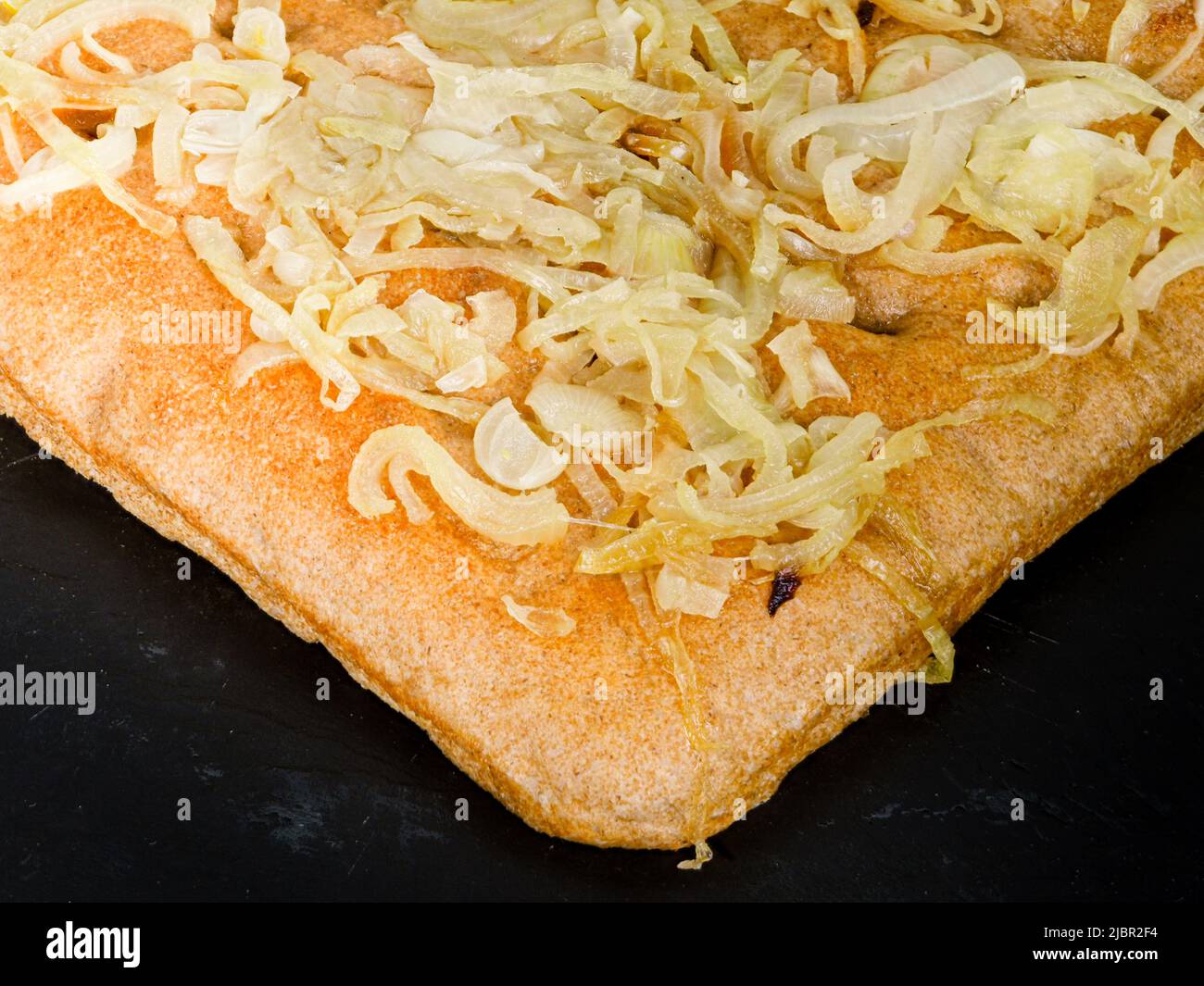 Onion Italian flat bread organic wholewheat focaccia - black background ...