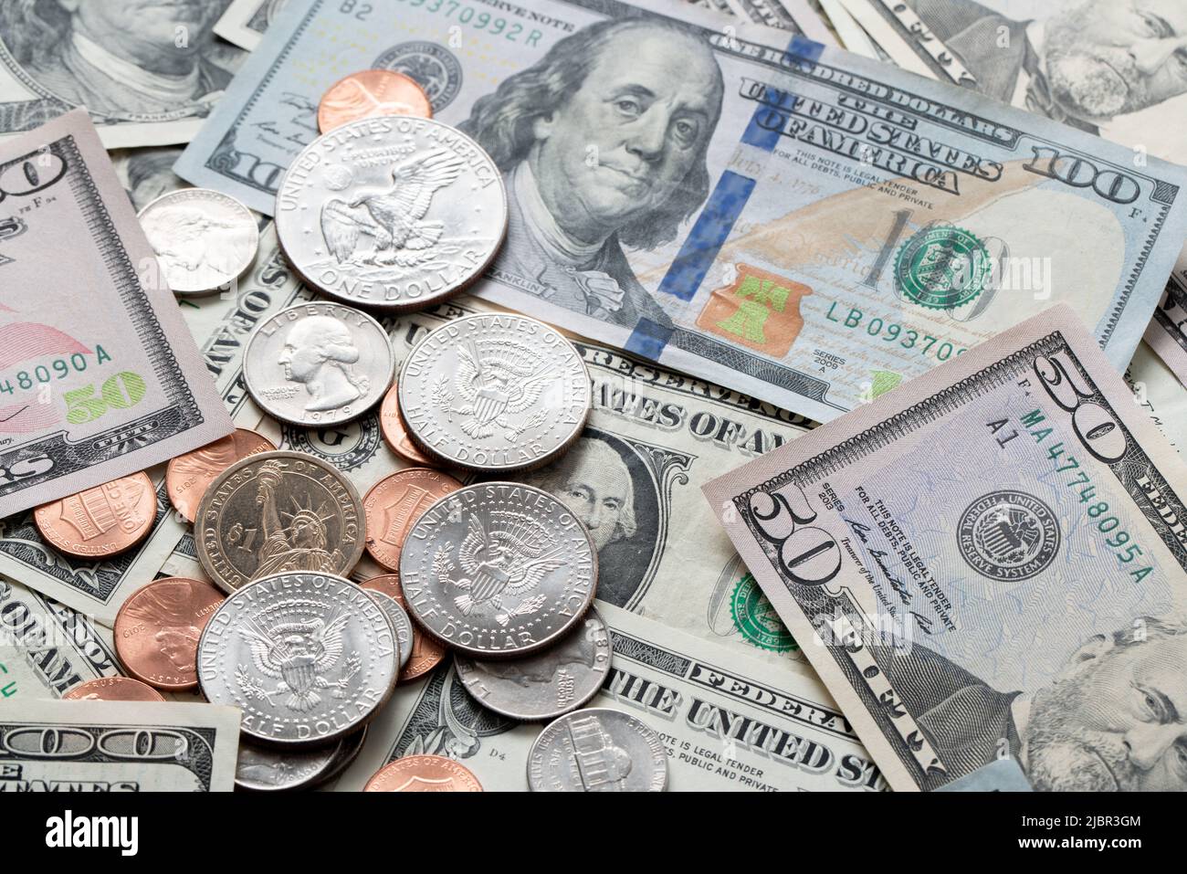 US Dollar Bills and Coins. Dollar Banknotes as Background, distributed ...