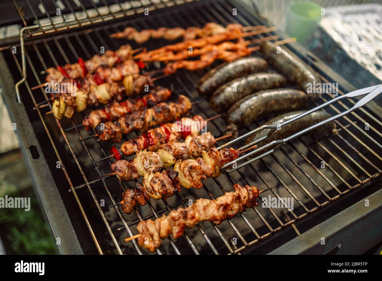 Men cooking food night hand hi-res stock photography and images - Alamy