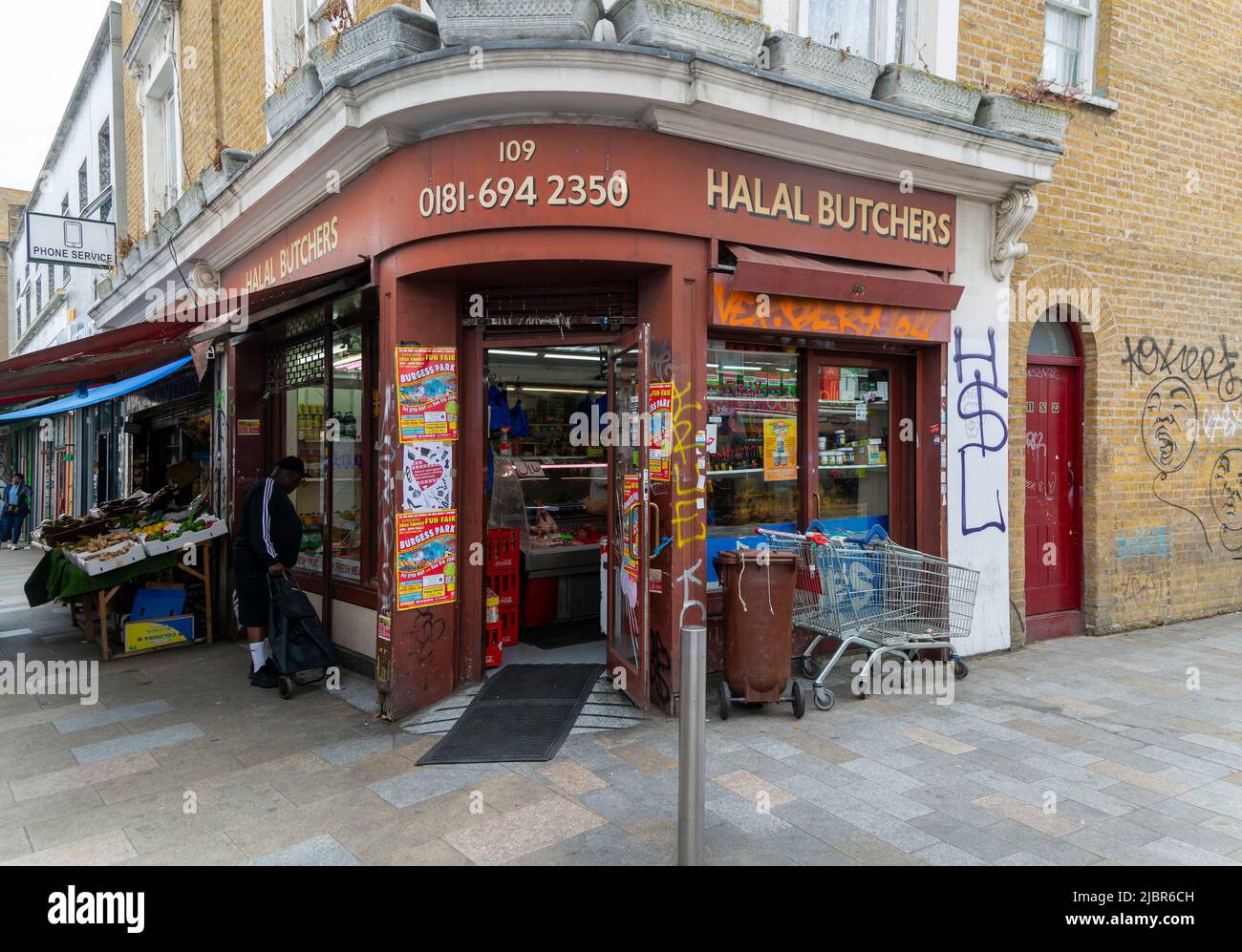 Halal butchers corner shop, Deptford High Street, London S8, England ...