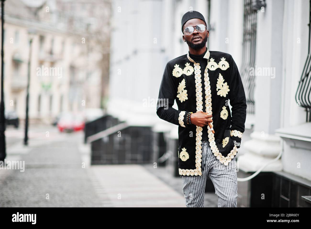 Mega stylish african man in traditional jacket pose. Fashionable black ...