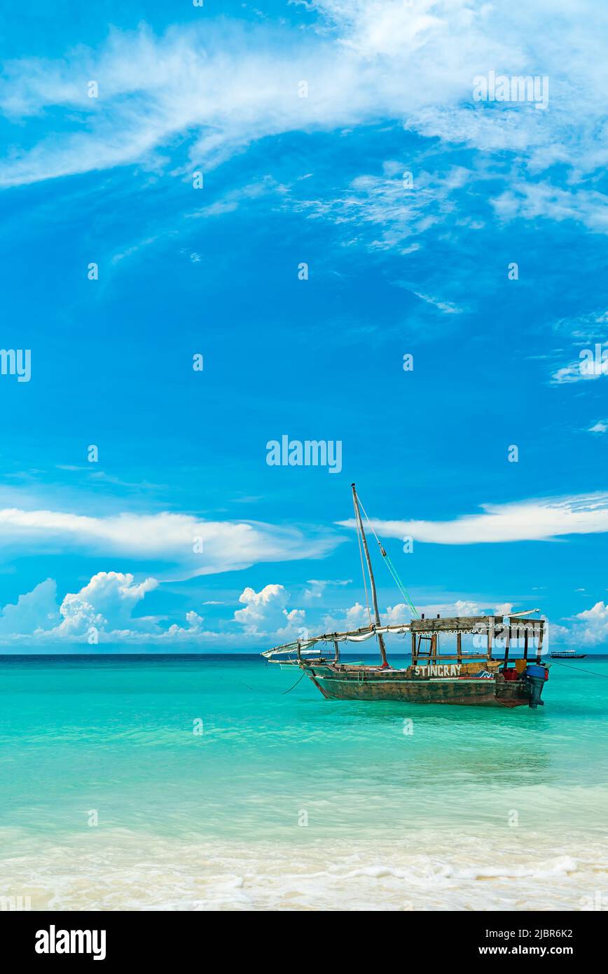 Fishing ship in water of Indian ocean. Zanzibar, Tanzania Stock Photo ...