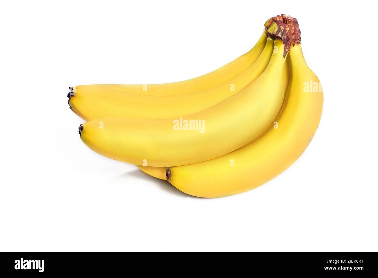Ripe yellow bananas on a white background Stock Photo - Alamy