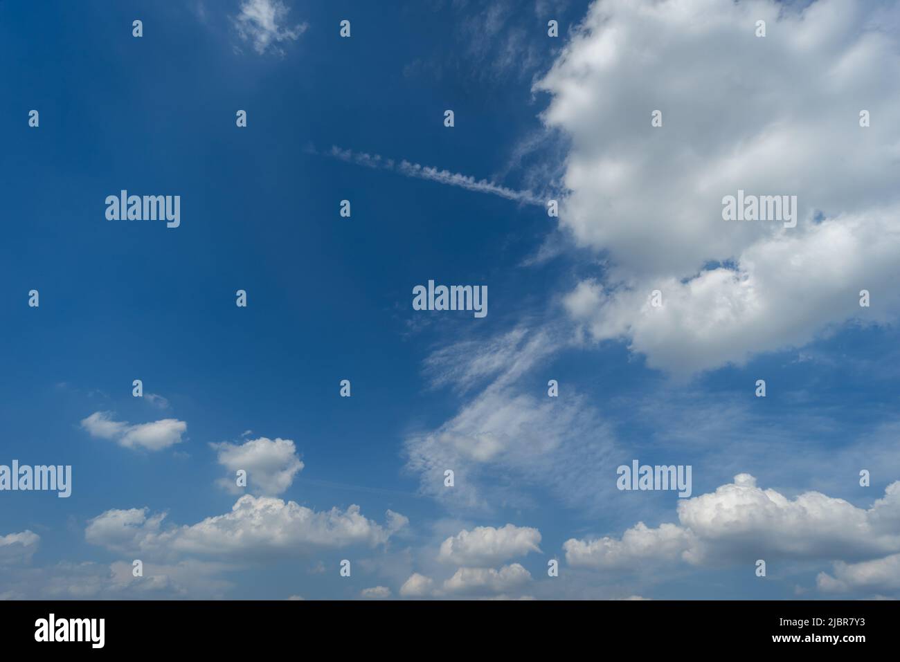 Blue sky with white clouds, cirrus clouds on blue summer sky, copy space, replacement sky ...