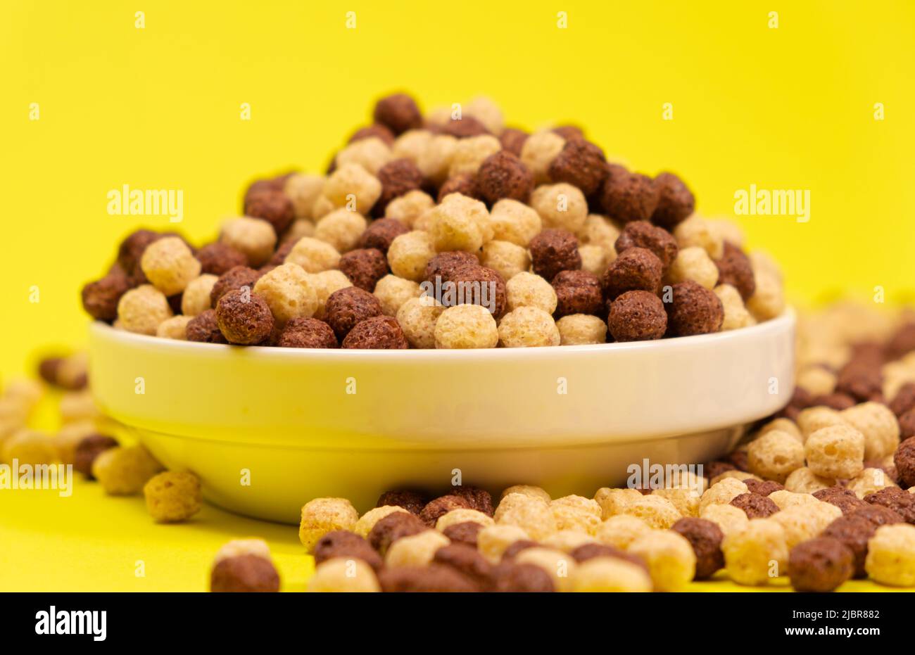 Corn sweet balls on a yellow background. Quick dry breakfasts, side ...