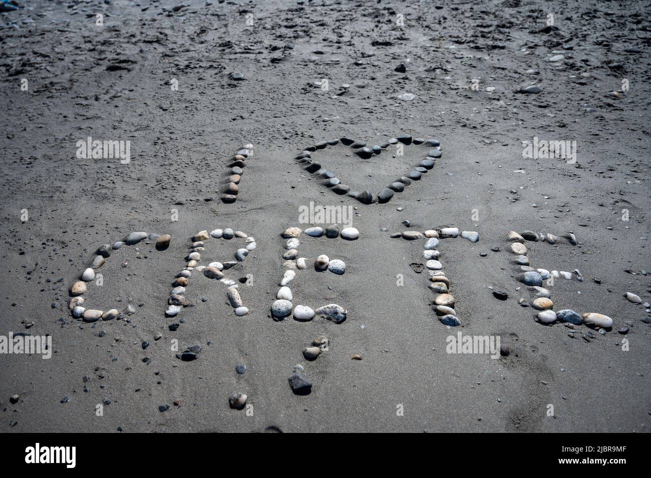 I love Crete written on sandy beach in Crete, Greece. Text I love crete ...