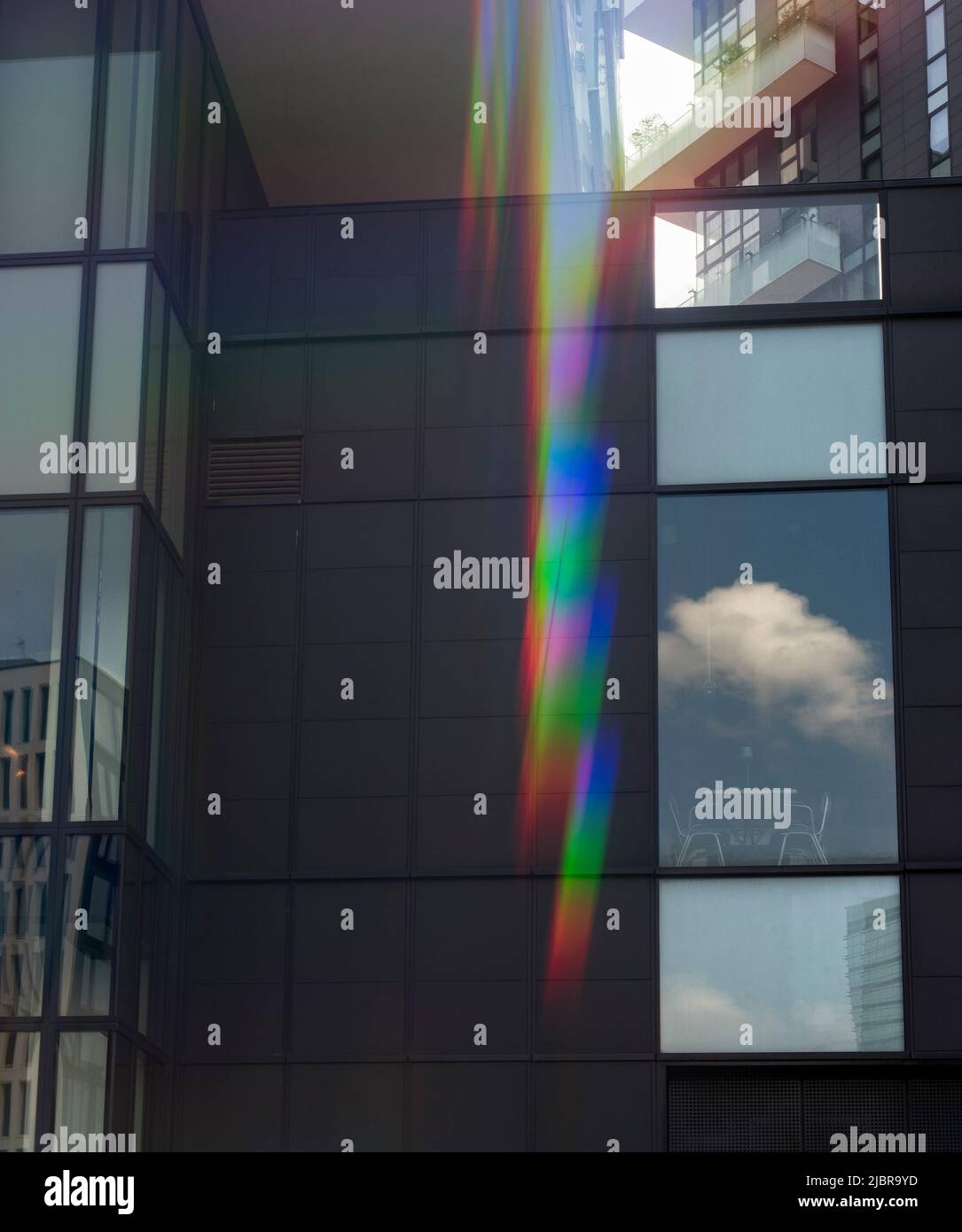 Modern architecture in the city with rainbow flare Stock Photo - Alamy