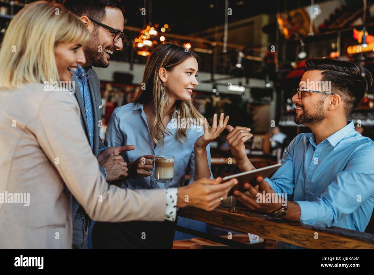 Business colleagues having conversation during coffee break Stock Photo ...