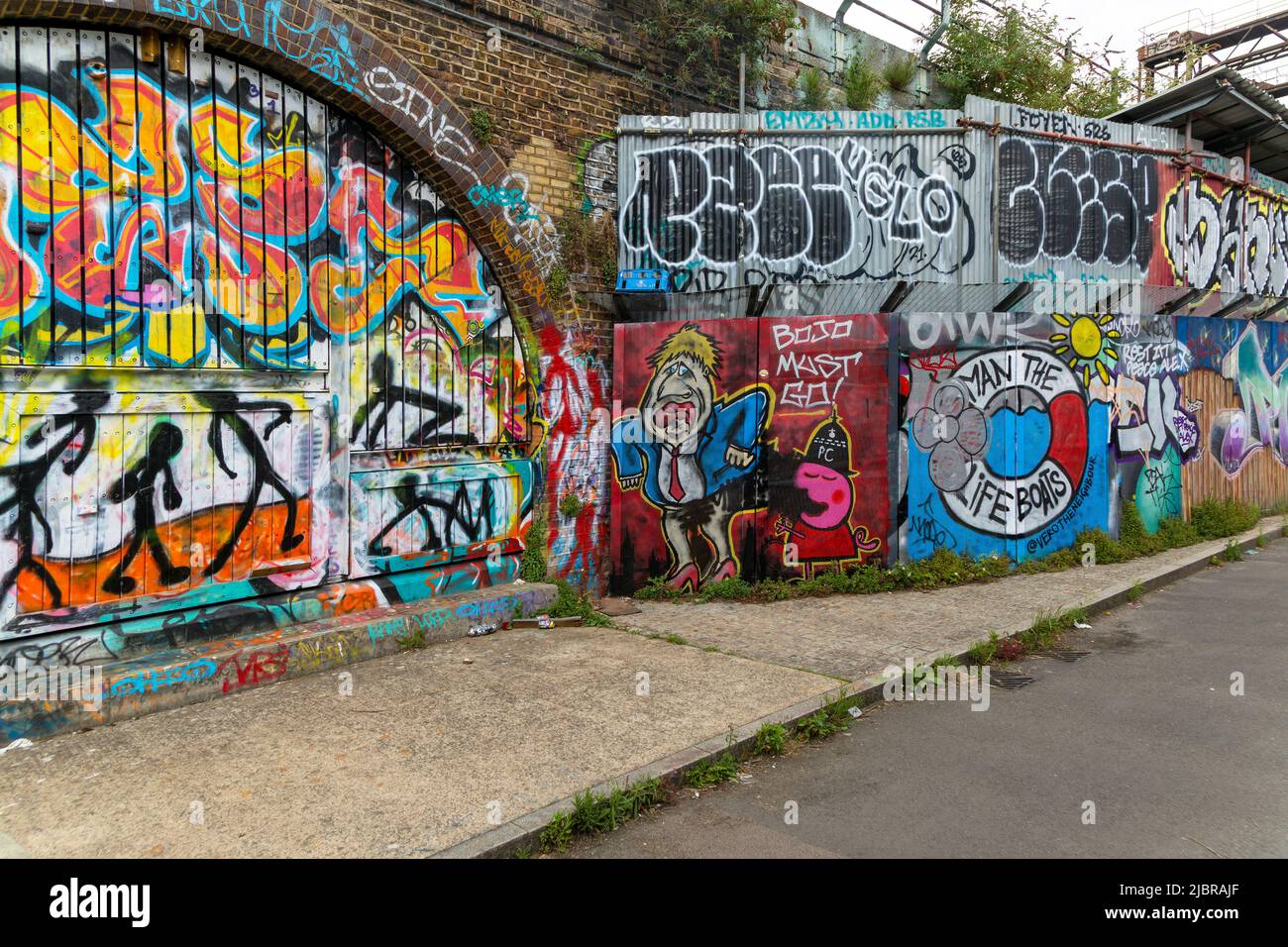 Graffiti art spay paintd on surfaces around railway arches, Deptford ...