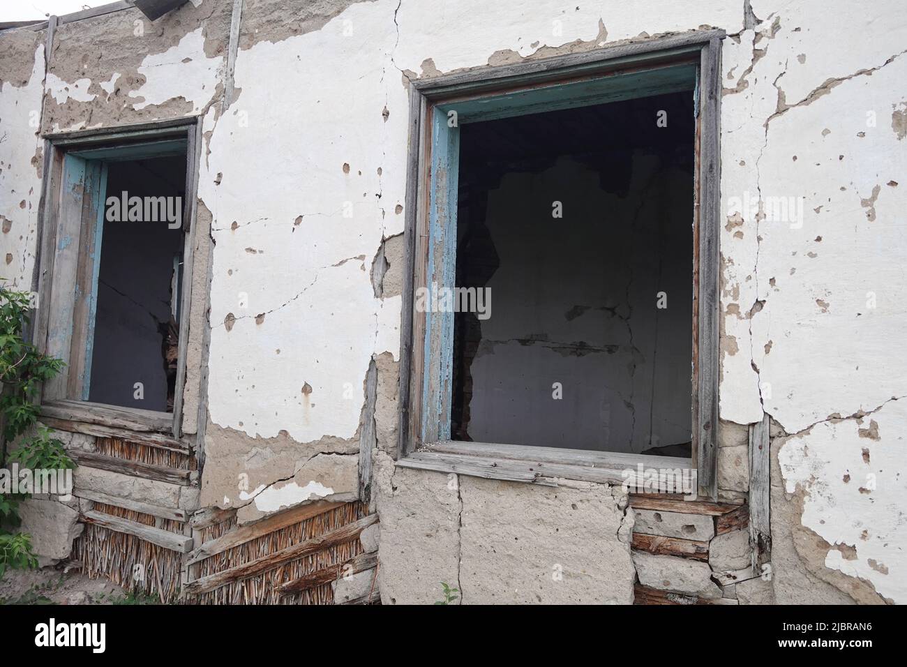 Abandoned house with empty windows Stock Photo - Alamy