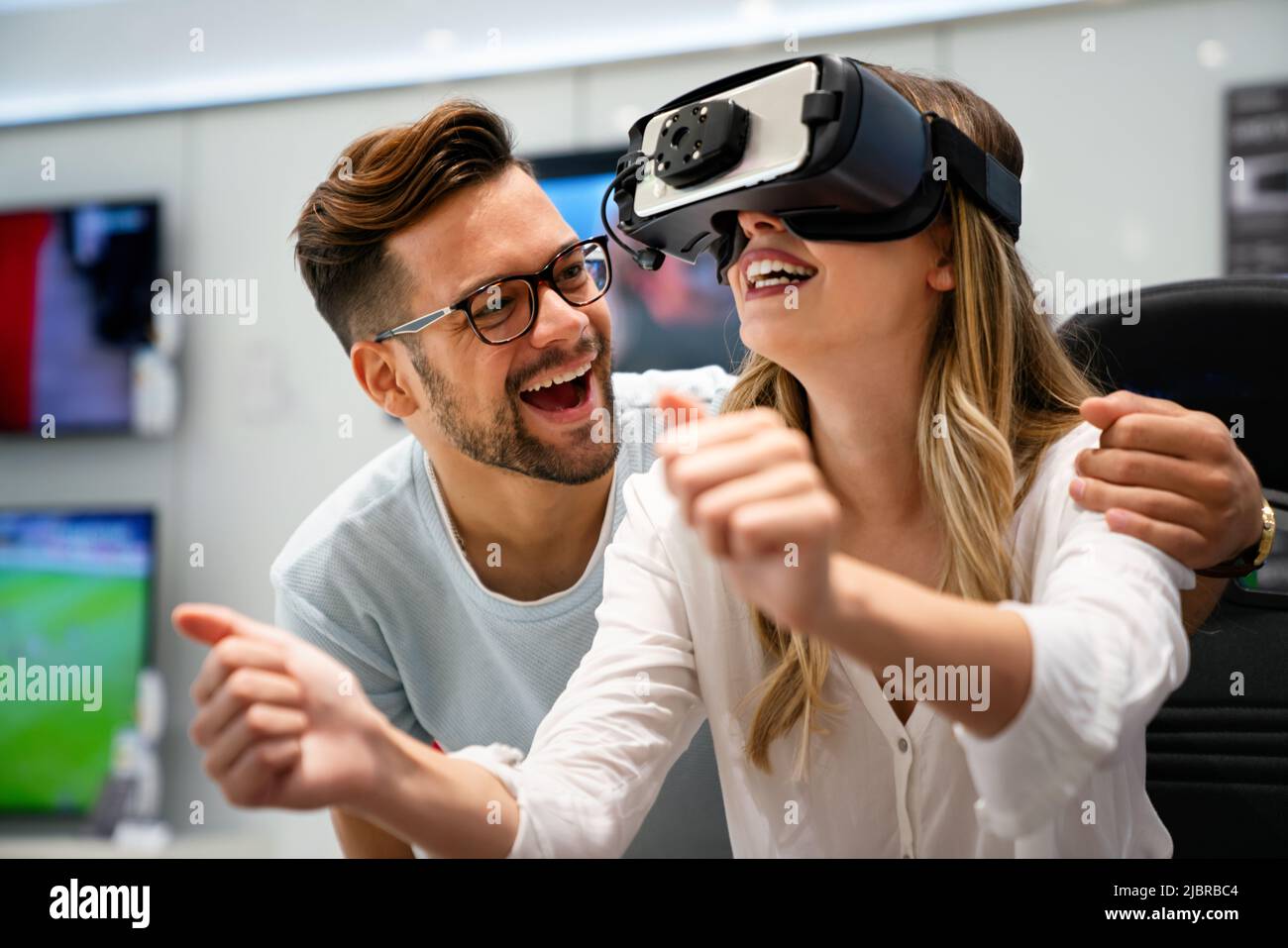 Group of people using virtual reality headset at exhibition, show. VR ...