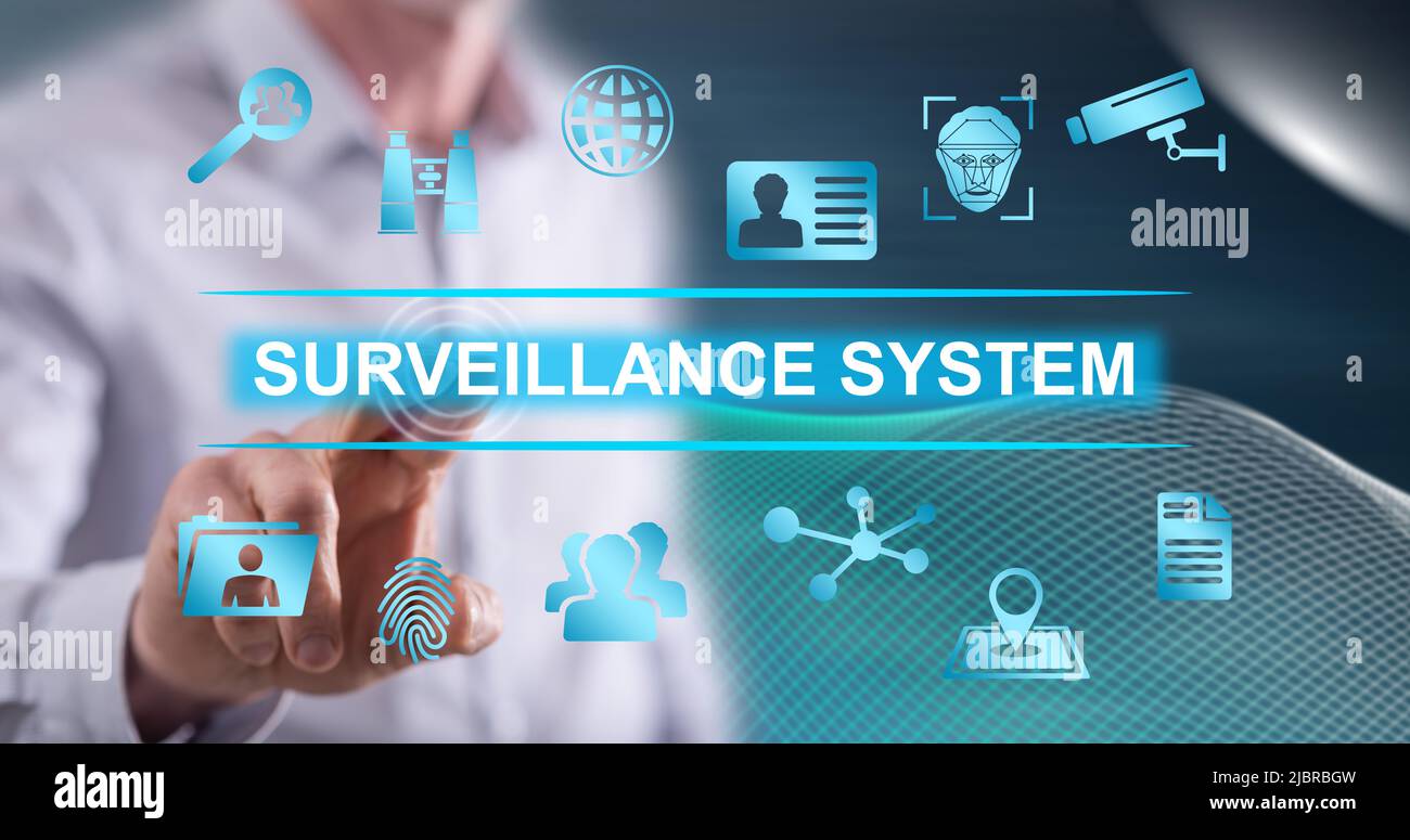 Man touching a surveillance system concept on a touch screen with his ...
