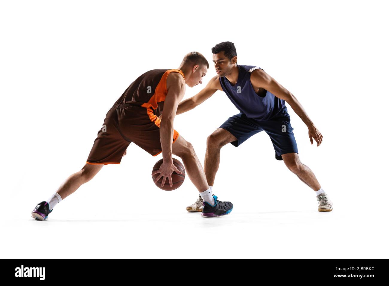 Dynamic portrait of two professional basketball players in motion ...