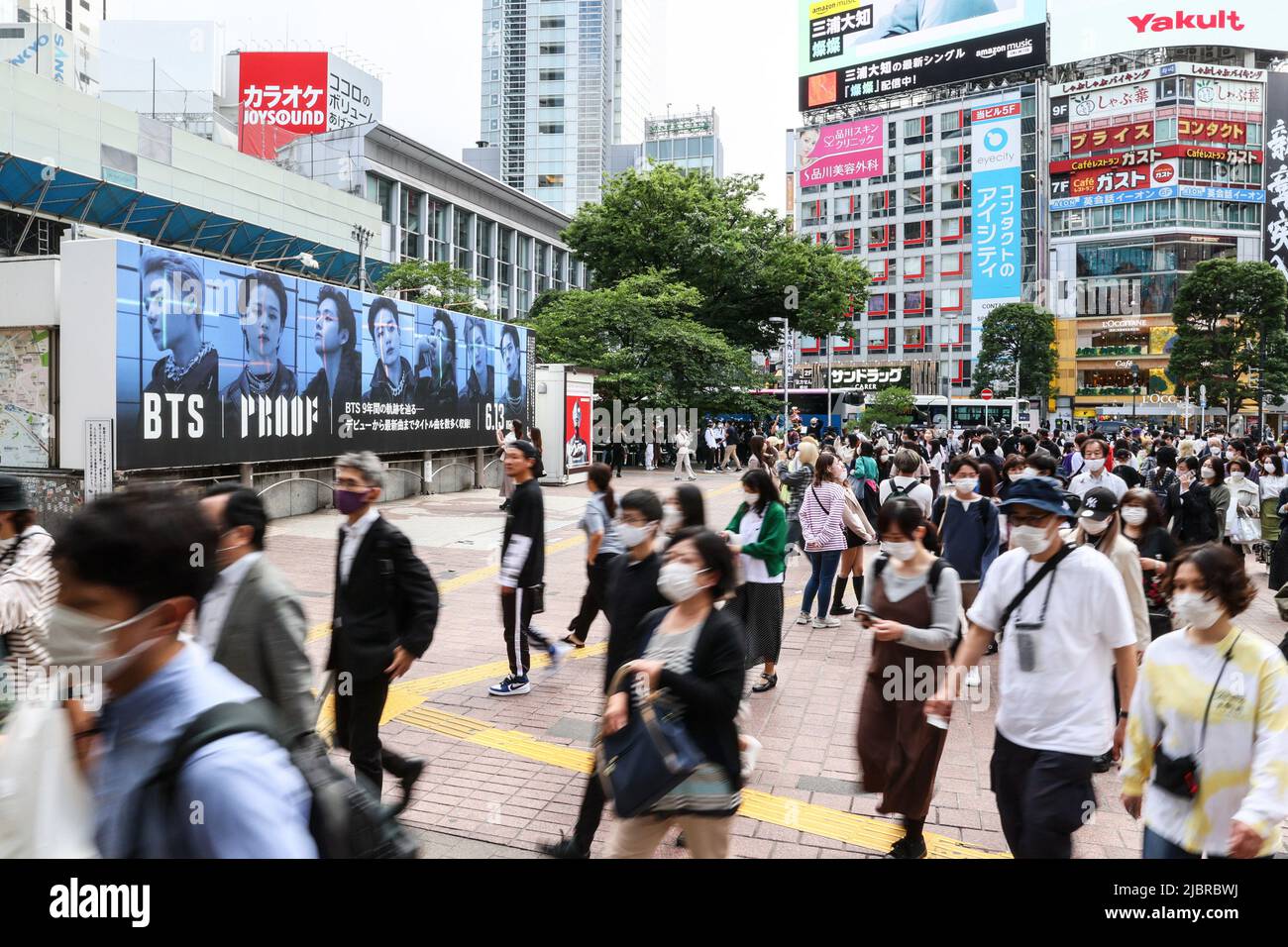 A billboard of South Korean boy band BTS is seen at Shibuya shopping ...