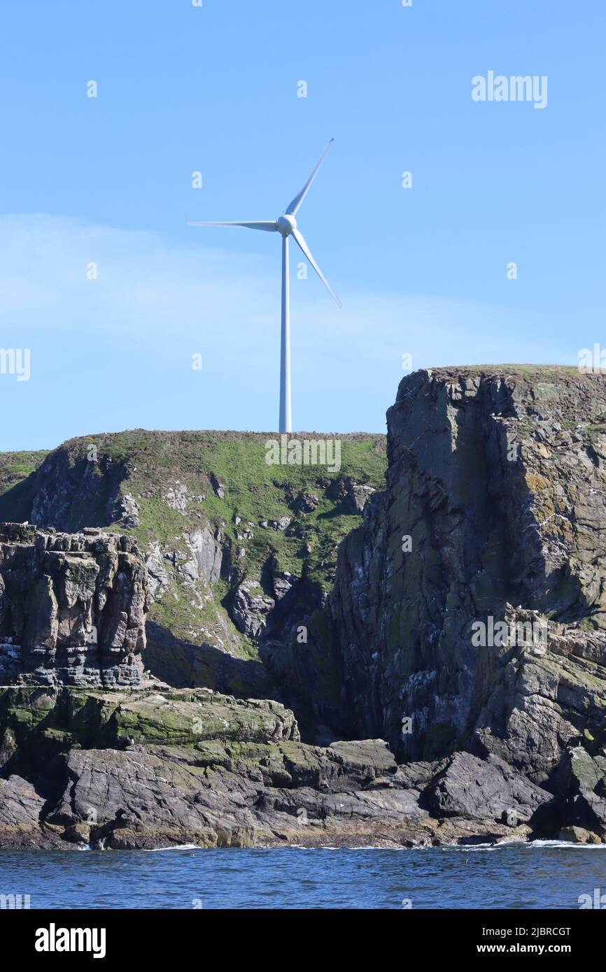 Wind turbine on cliffs Stock Photo - Alamy