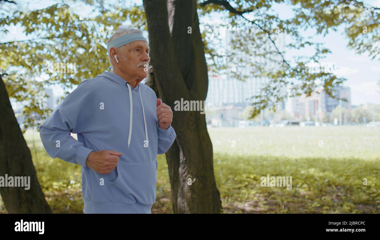 Athletic fitness senior elderly sport runner man training. Workout ...