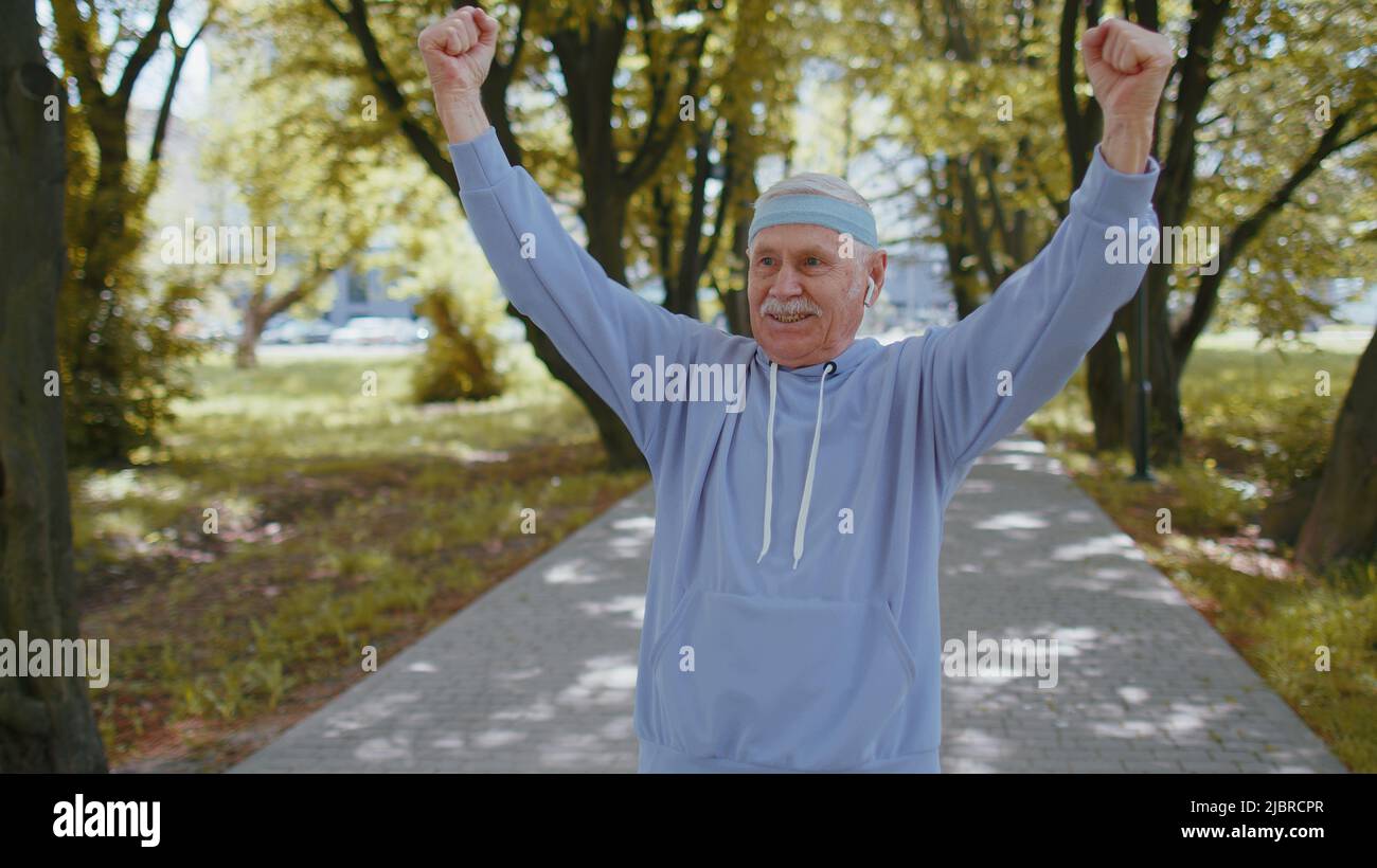 Successful senior old man celebrating hi-res stock photography and ...