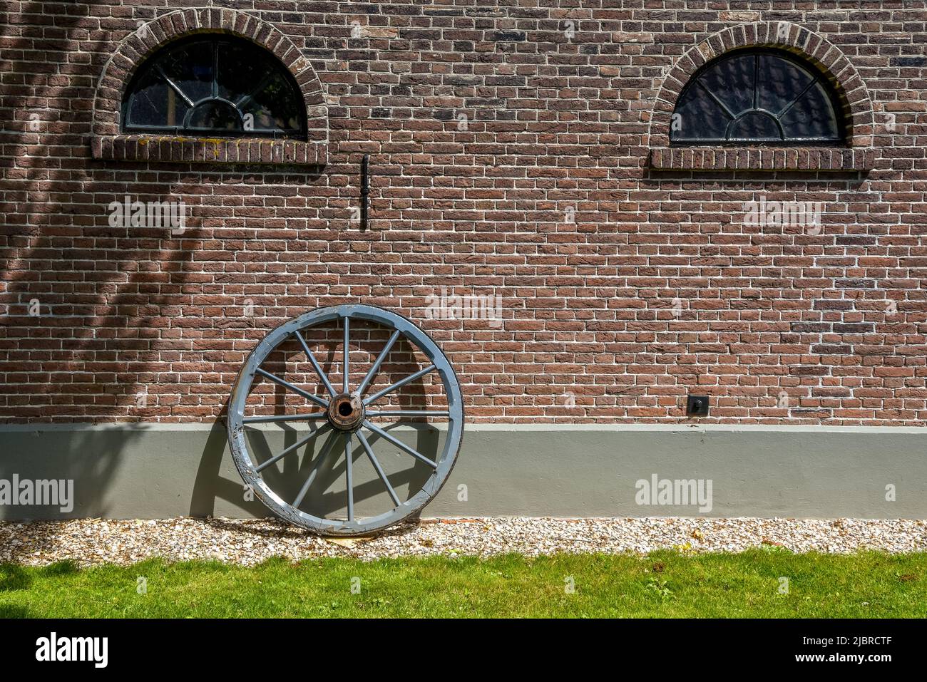 Beemster, Netherlands, May 2022. A traditional farm with old agricultural tools. High quality ...
